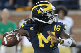 Michigan quarterback Denard Robinson is Big Ten Offensive Player of the ...