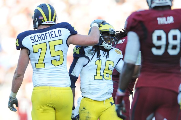 Images from Michigan's 33-28 loss to South Carolina in the Outback Bowl