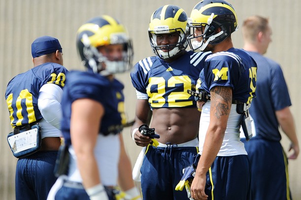Images from Michigan football fall camp practice at Al Glick Field House