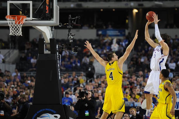 Images from Michigan's thrilling 87-85 overtime Sweet 16 win over Kansas