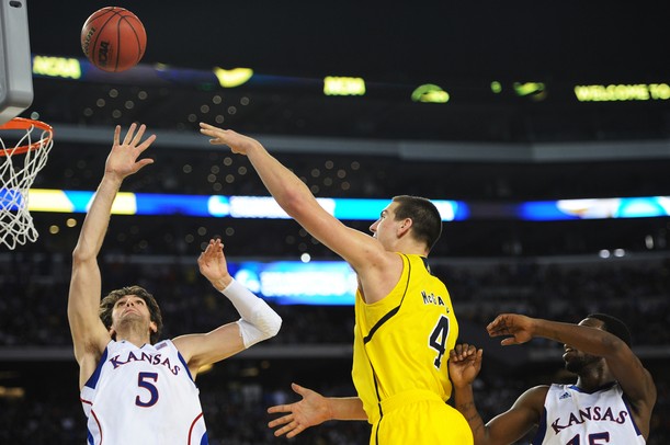 Images from Michigan's thrilling 87-85 overtime Sweet 16 win over Kansas
