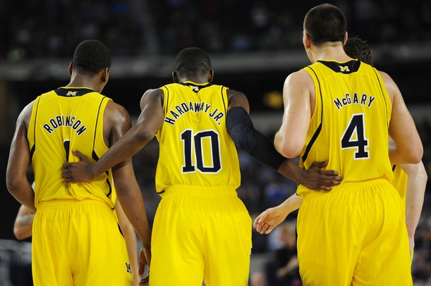 Images from Michigan's thrilling 87-85 overtime Sweet 16 win over Kansas