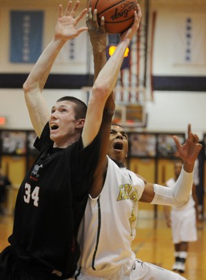 Images from Pioneer and Huron's boys basketball district wins