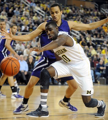 Images from the Michigan basketball team's 66-64 overtime win against ...