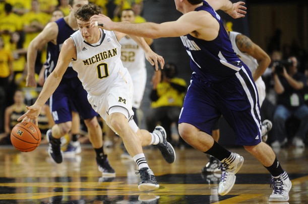 Images from the Michigan basketball team's 66-64 overtime win against ...