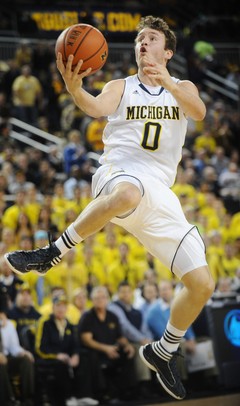 Images from the Michigan basketball team's 66-64 overtime win against ...