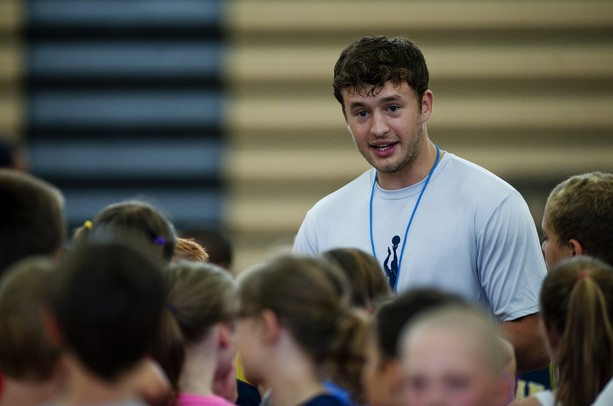 Former Michigan captain Zack Novak and current players hold summer ...