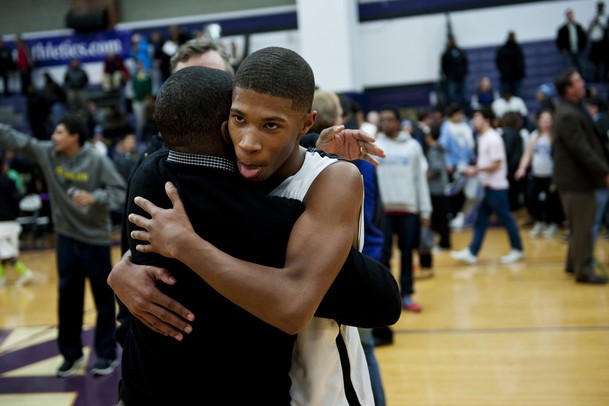 Images from the Pioneer boys basketball team's 64-47 win over rival Huron