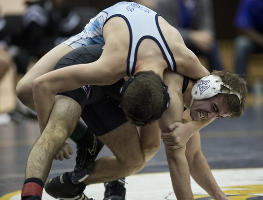 Saline beats Pioneer for third straight wrestling district title and ...